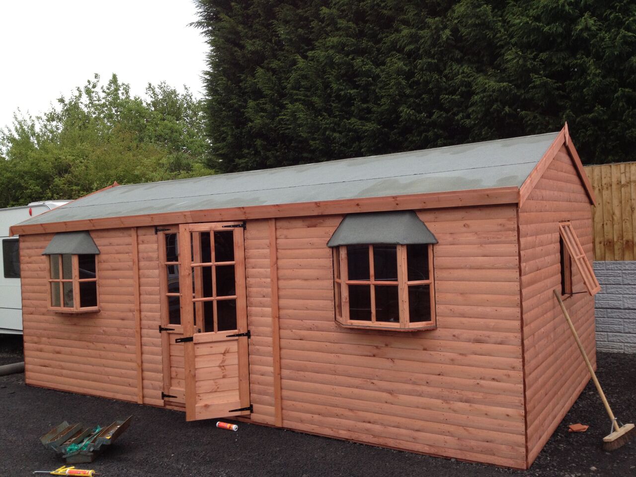 Log effect building Apex roof - Direct Fencing Manchester